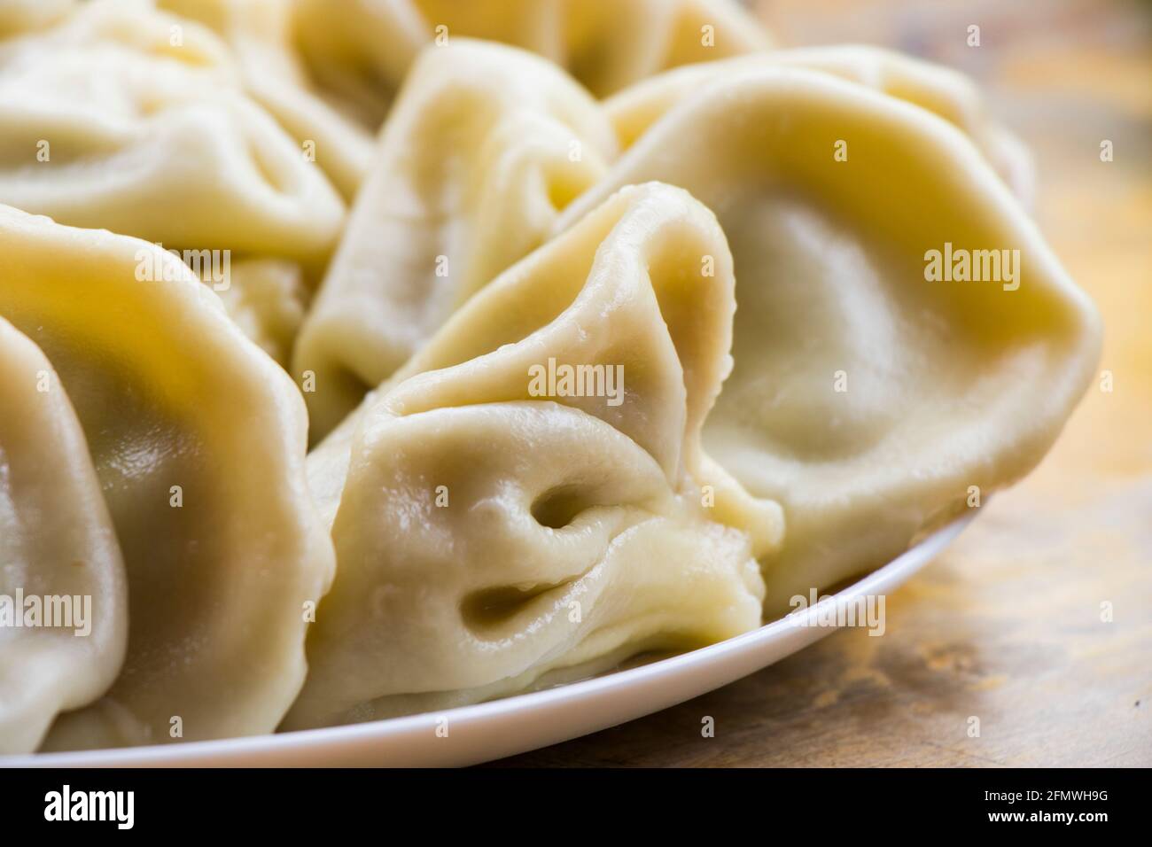 Traditional Georgian dish Khinkali, Georgian dumplings on the plate ...