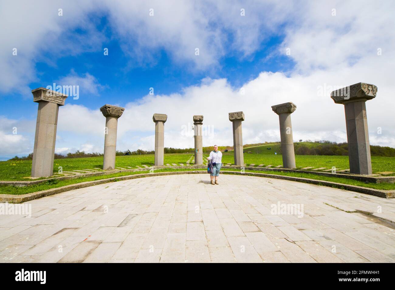 Women take self photo with self stick, traveler in Didgori monument in ...