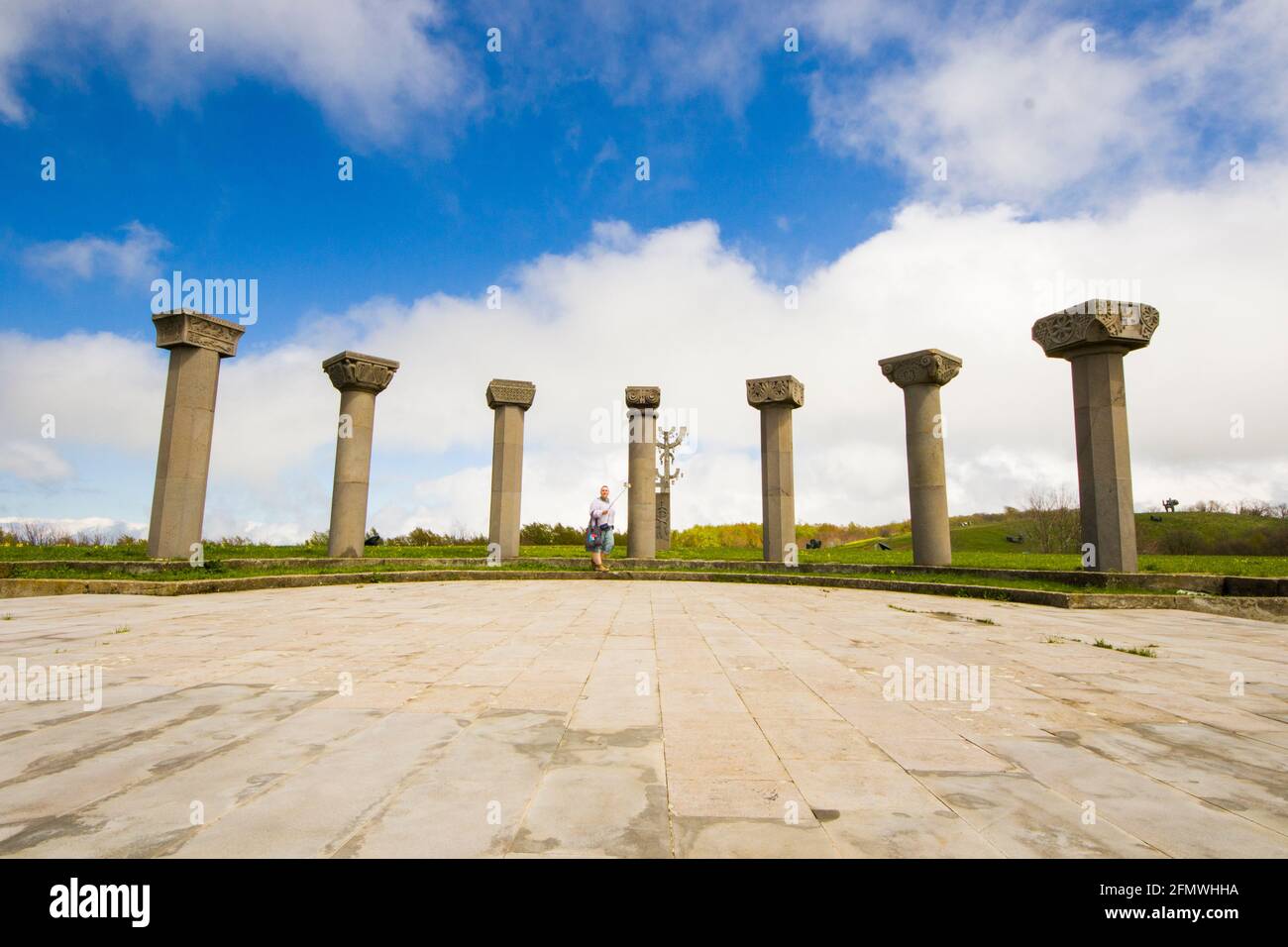 Women take self photo with self stick, traveler in Didgori monument in ...