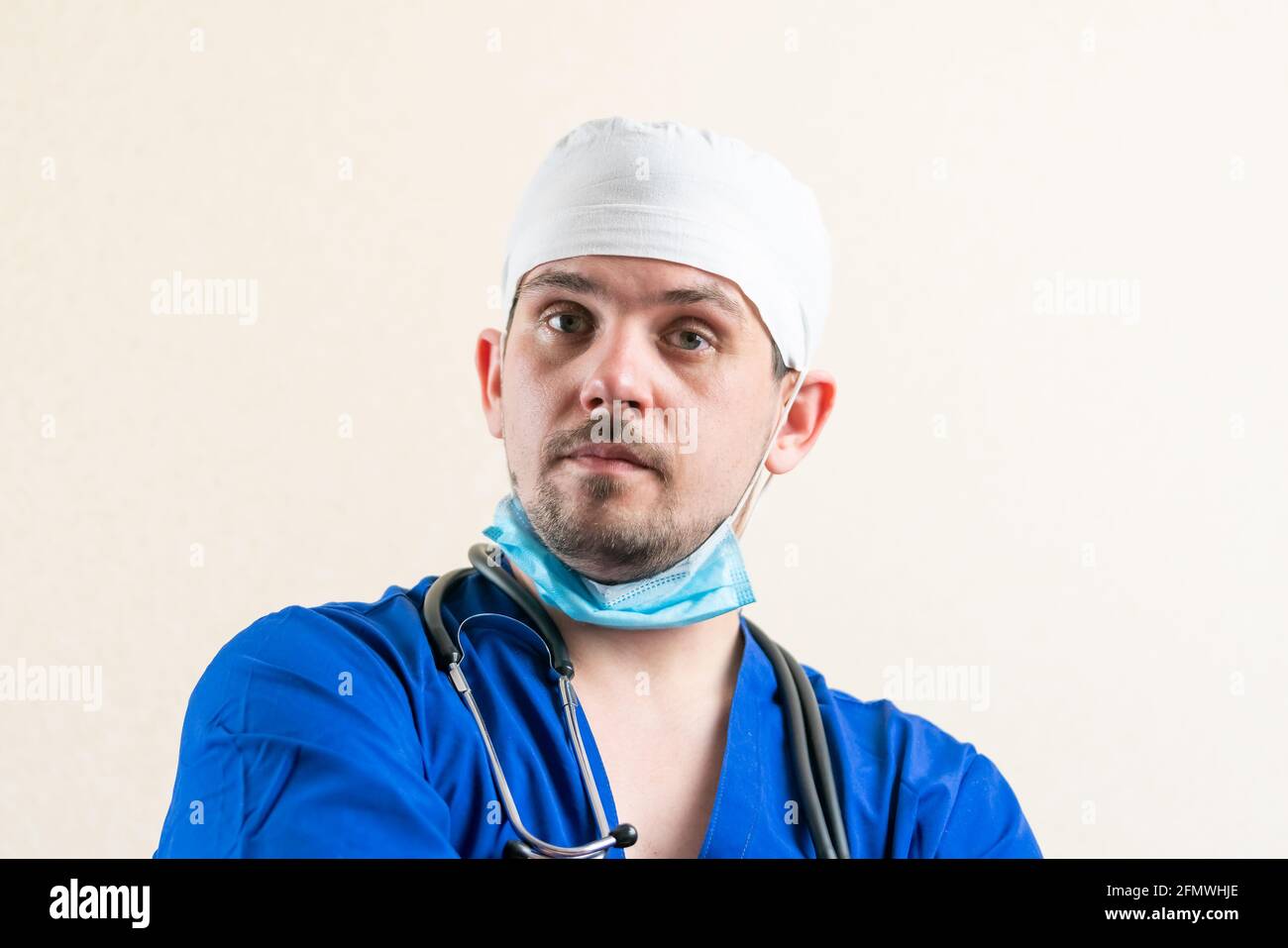 Doctor in blue uniform and medical mask. High quality photo Stock Photo ...