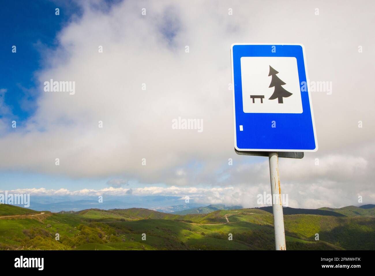 Camping road sign and mountain landscape in Georgia Stock Photo - Alamy