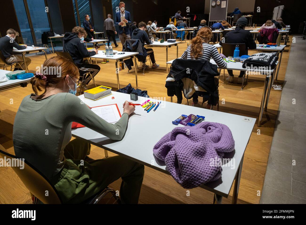 Munich, Germany. 12th May, 2021. Students sit under the supervision of ...