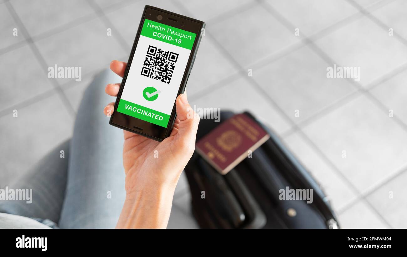 Digital Health Passport app for smartphone with vaccinated sign and ...