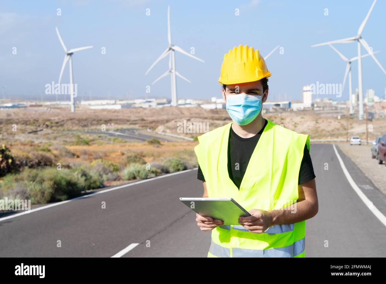 Worker mask wind turbine hi-res stock photography and images - Alamy