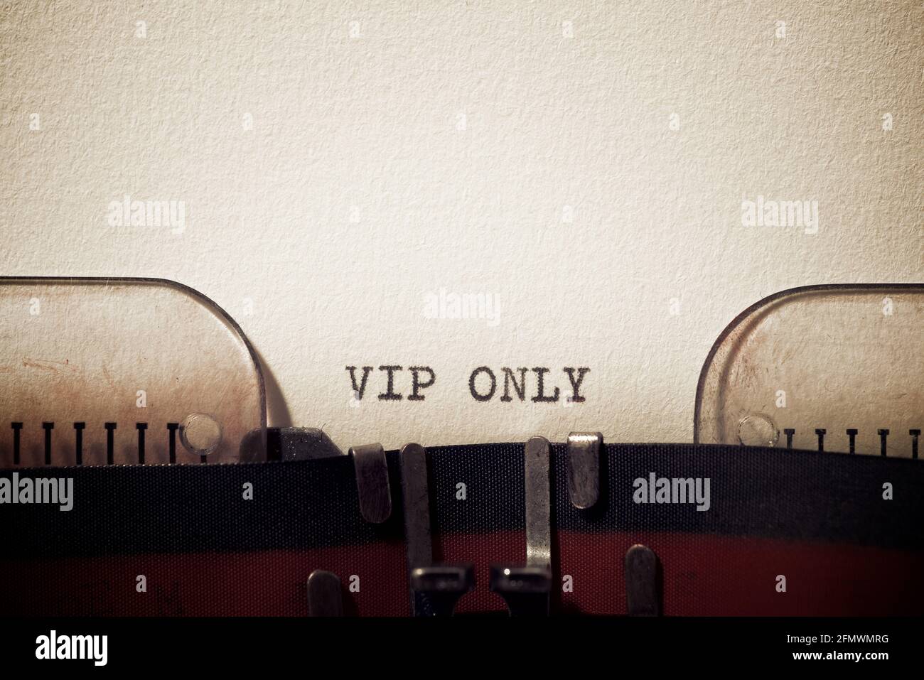 Vip only phrase written with a typewriter Stock Photo - Alamy