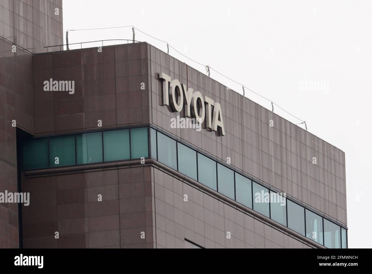 Tokyo, Japan. 12th May, 2021. A logo of Toyota on display outside its ...