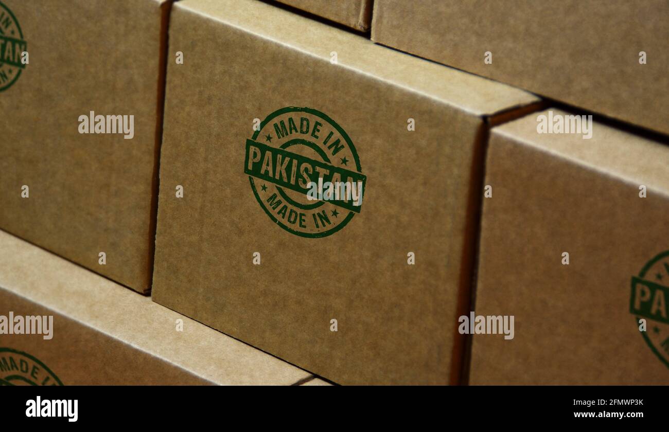 Made in Pakistan stamp printed on cardboard box. Factory, manufacturing ...