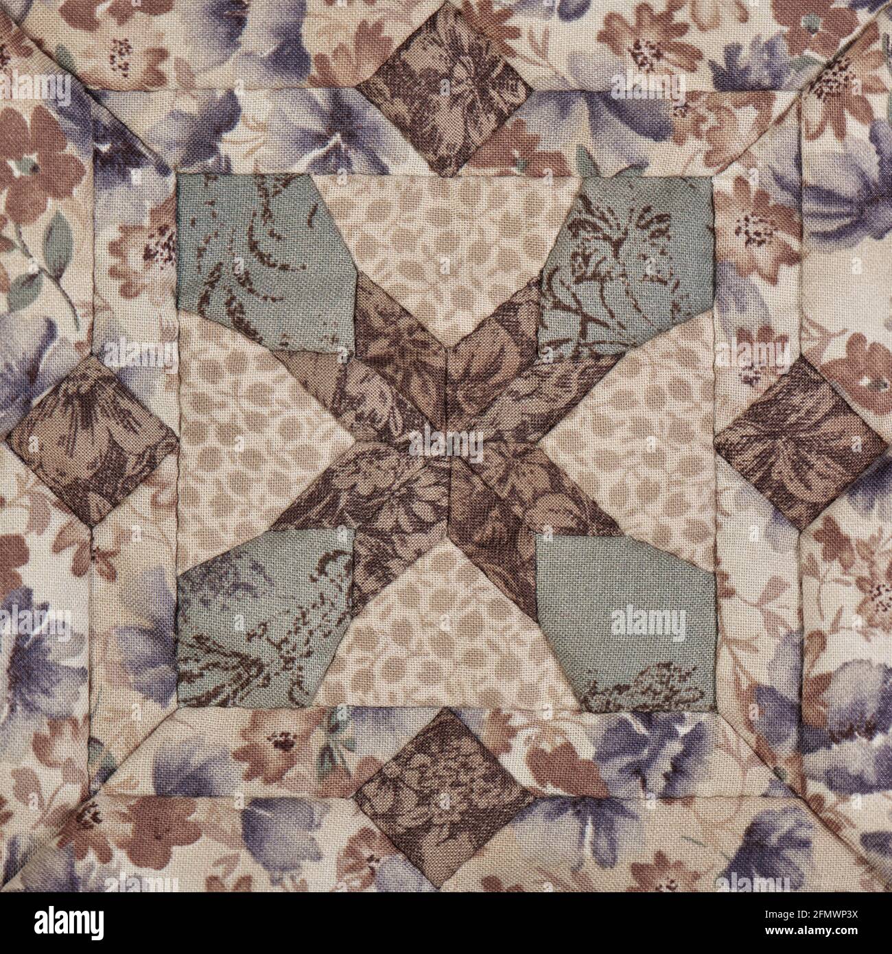 Patchwork block from pieces of fabrics, detail of quilt Stock Photo - Alamy