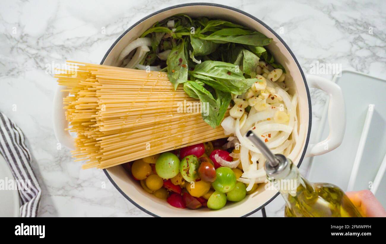Flat lay. Step by step. Cooking on pot pasta recipe in an enameled cast ...