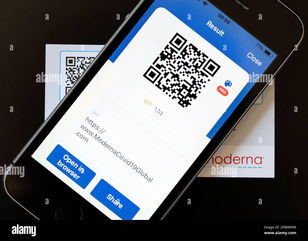 Covid 19 vaccine and vaccination UK concept. Moderna vaccine mobile app ...