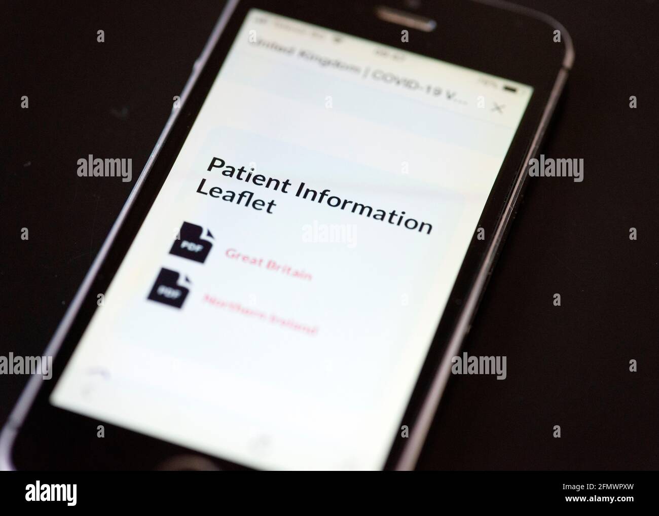 Covid 19 vaccine and vaccination UK concept. Moderna vaccine mobile app ...