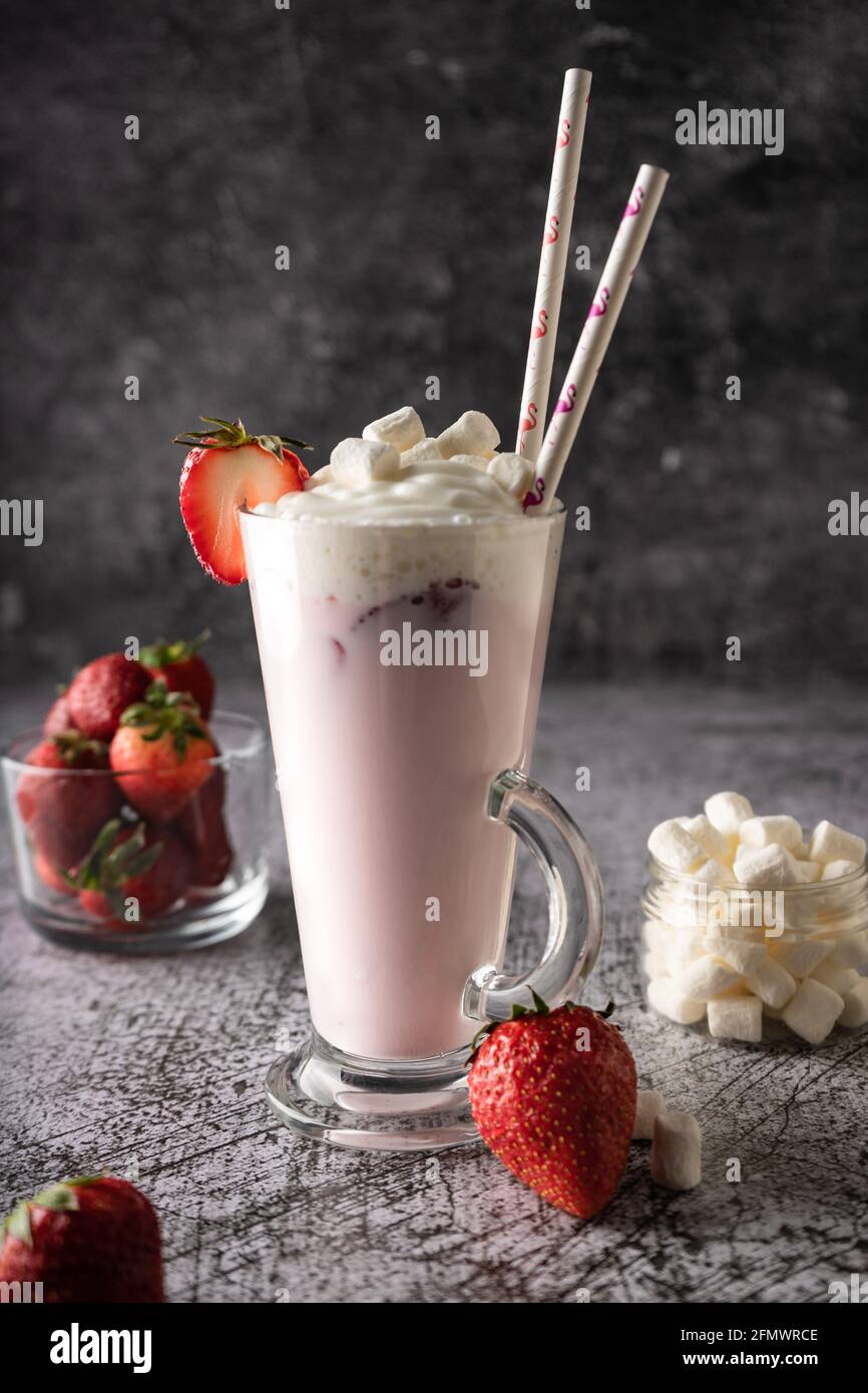 Glass of strawberry milkshake hi-res stock photography and images - Alamy