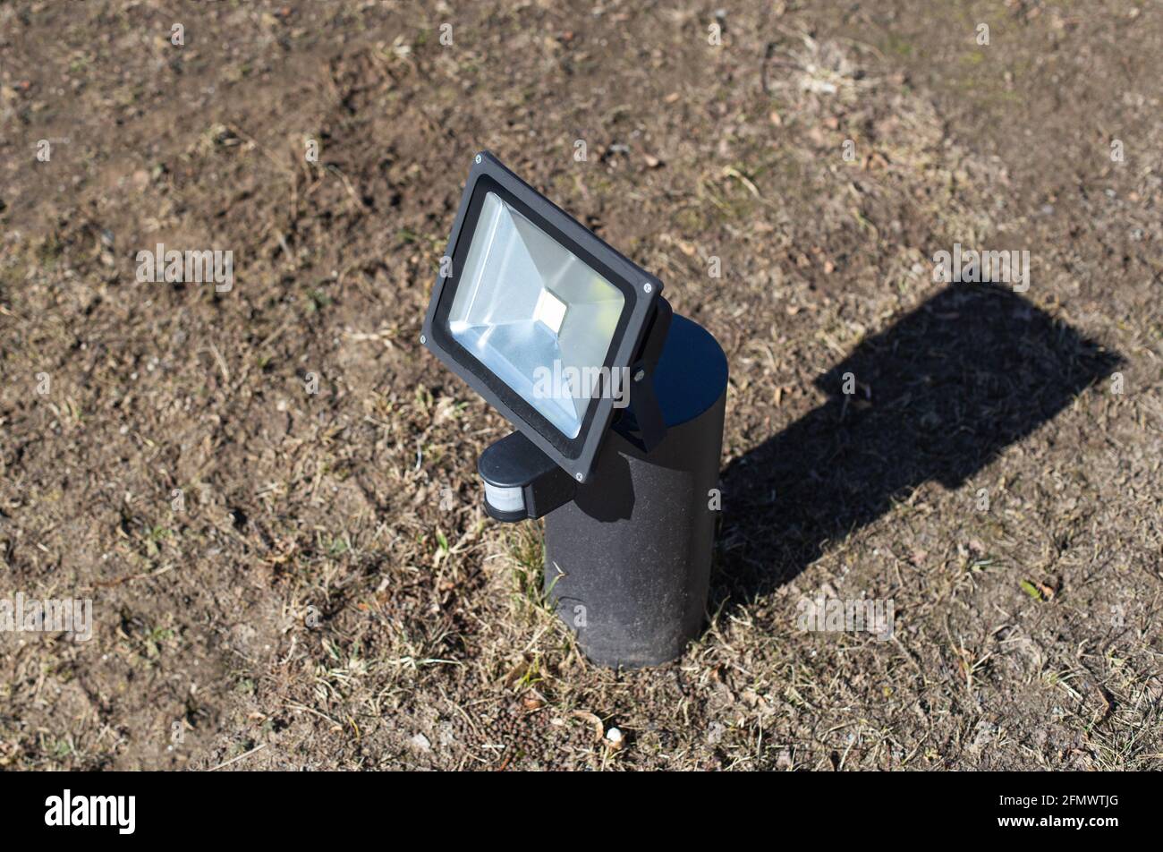 Outdoor diode floodlight with motion and light sensor, modern Stock ...