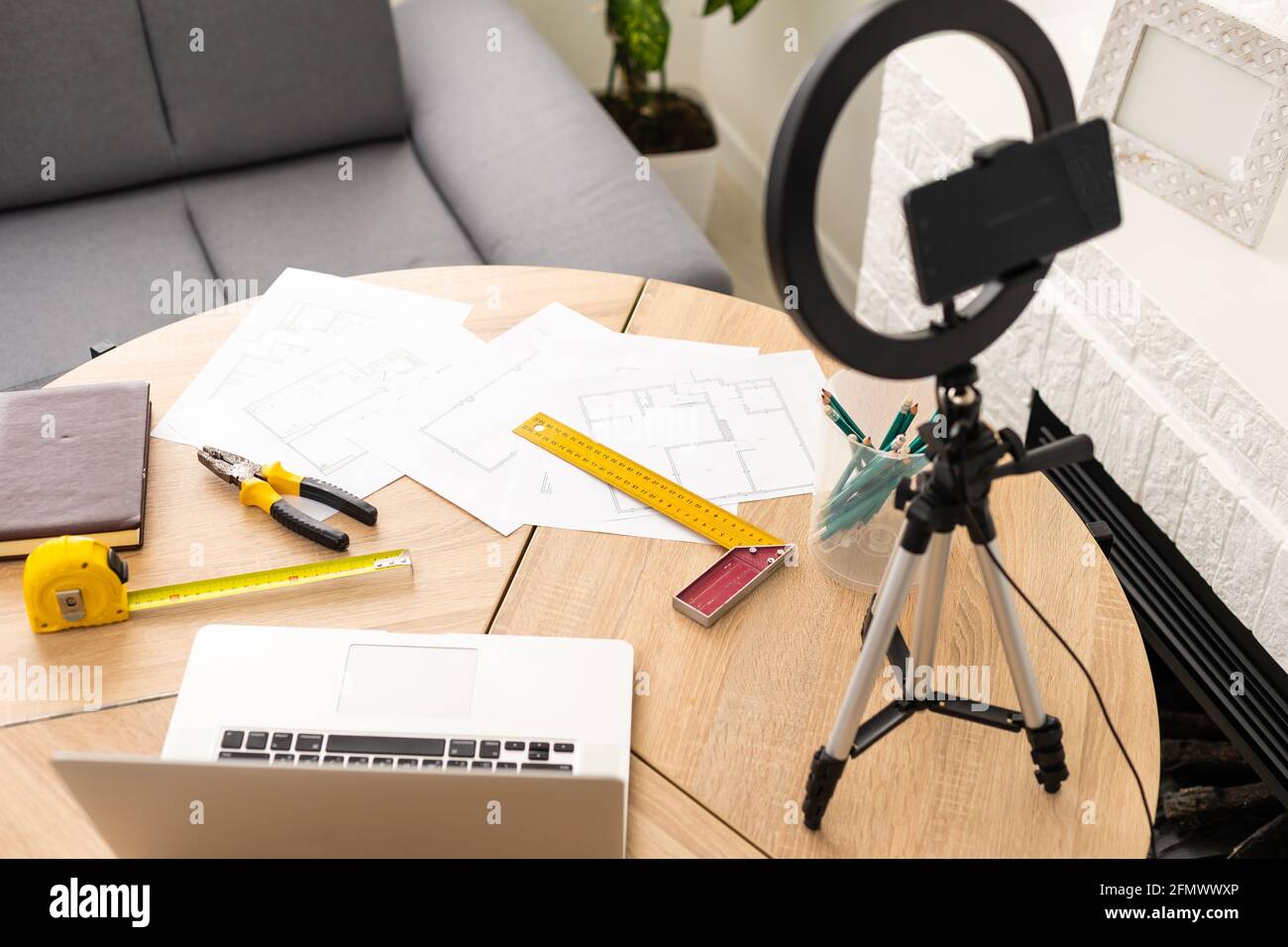 Architect working on blueprint. Architects workplace - architectural ...