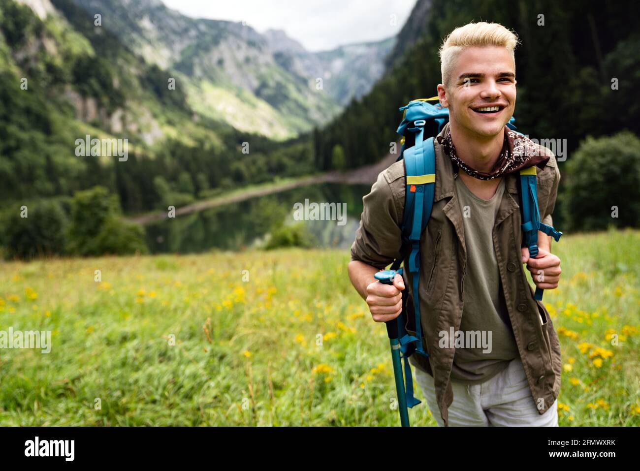 Active healthy man hiking in beautiful nature. Outdoor activity, sport ...