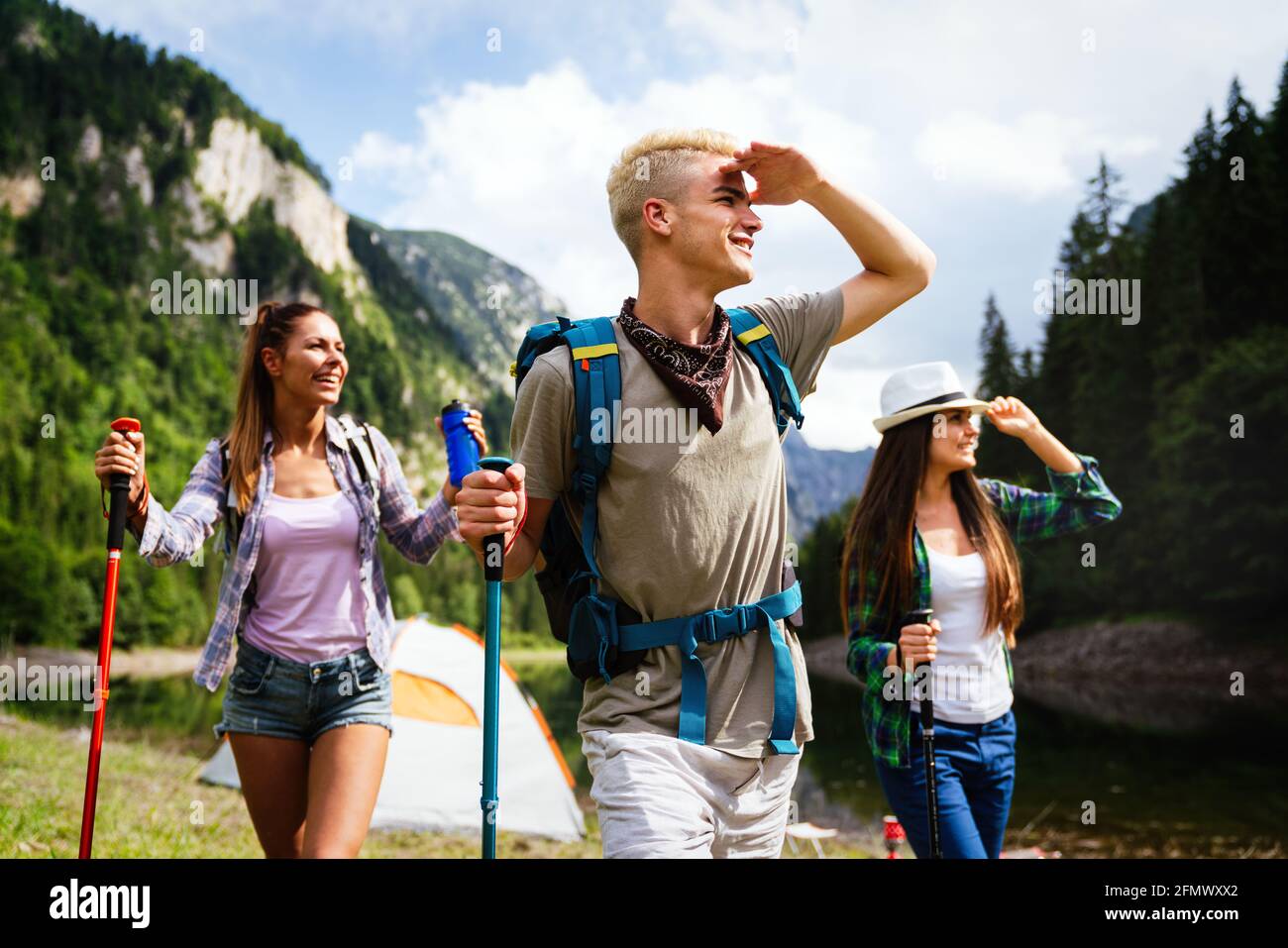 Adventure, travel, tourism, hike and people concept. Group of happy ...