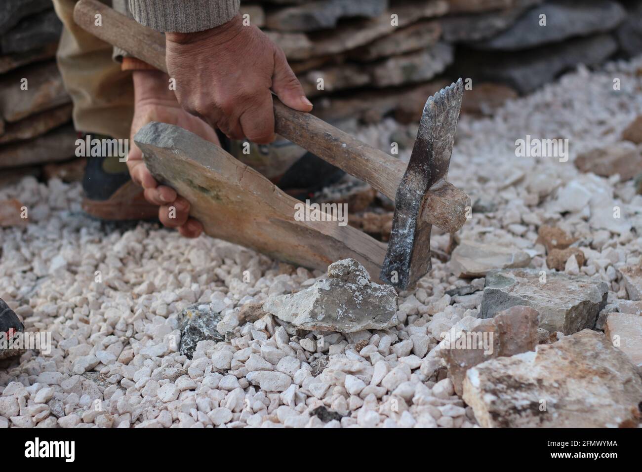 stone masonry wall building handmade craft traditional Stock Photo - Alamy