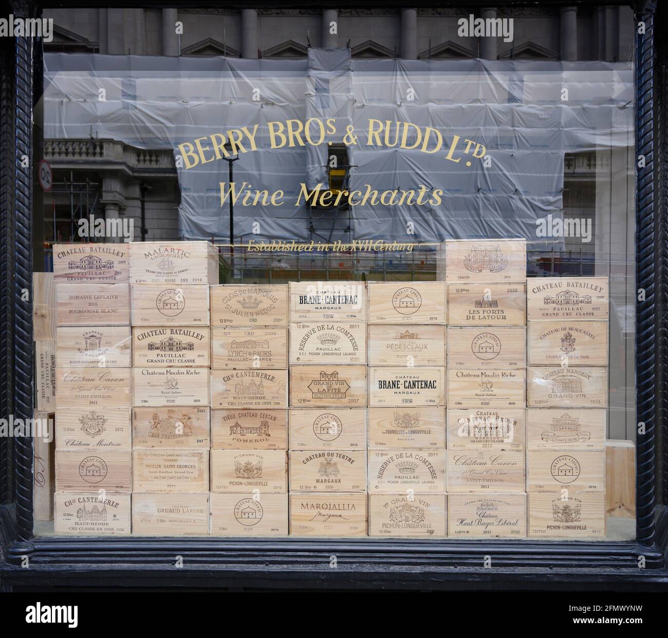 Fine Wine cases stacked in window display of Berry Brothers & Rudd Ltd ...
