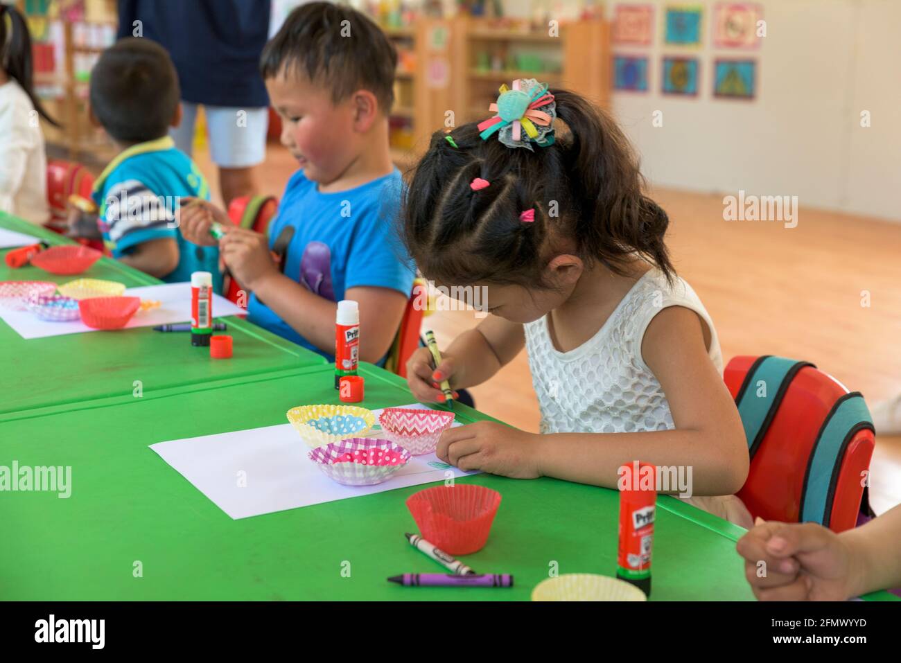Students in a primary school in rural China working on an art and craft ...