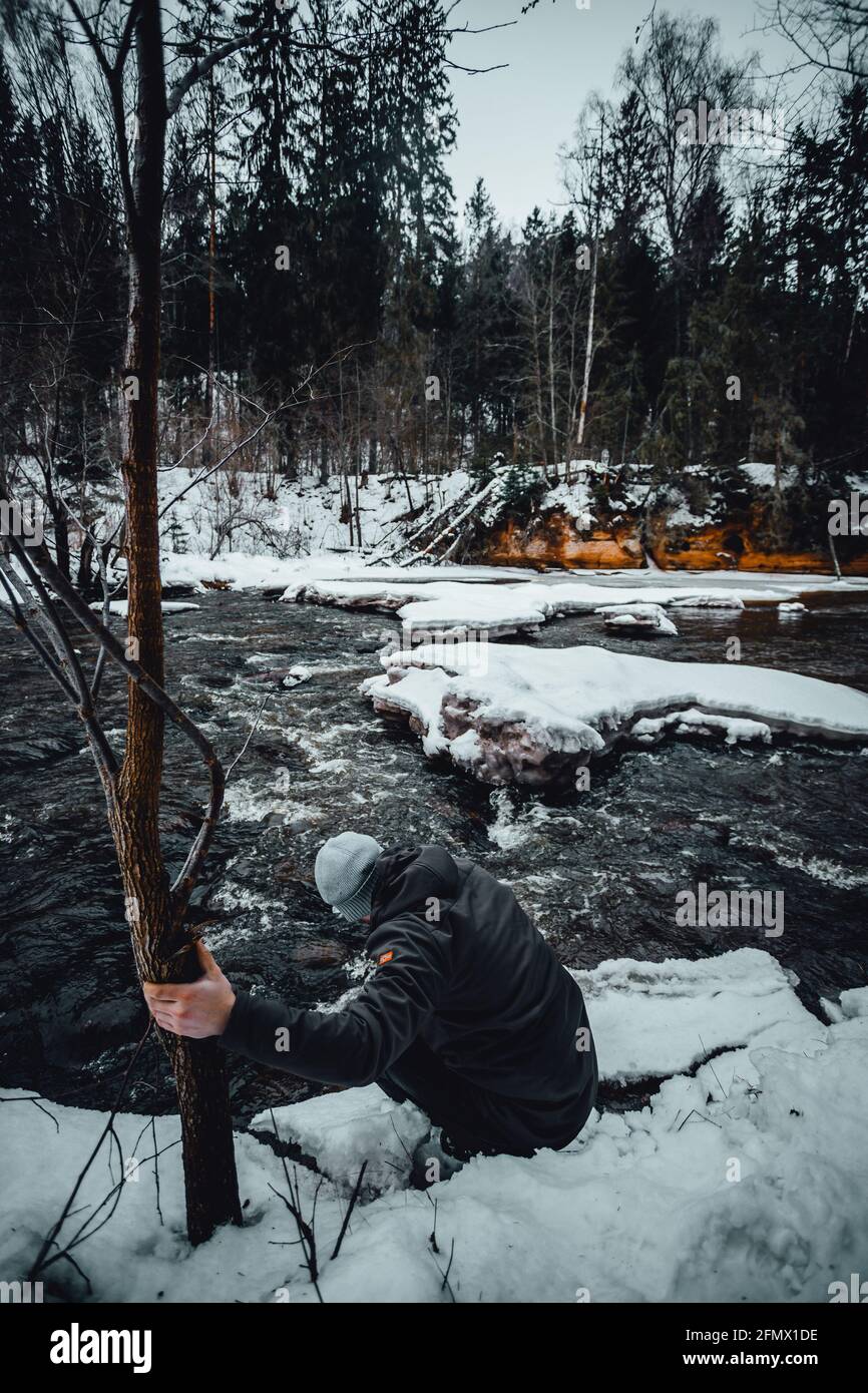 Vertical shot of a person on the frozen river in Baku, Azerbaijan Stock ...