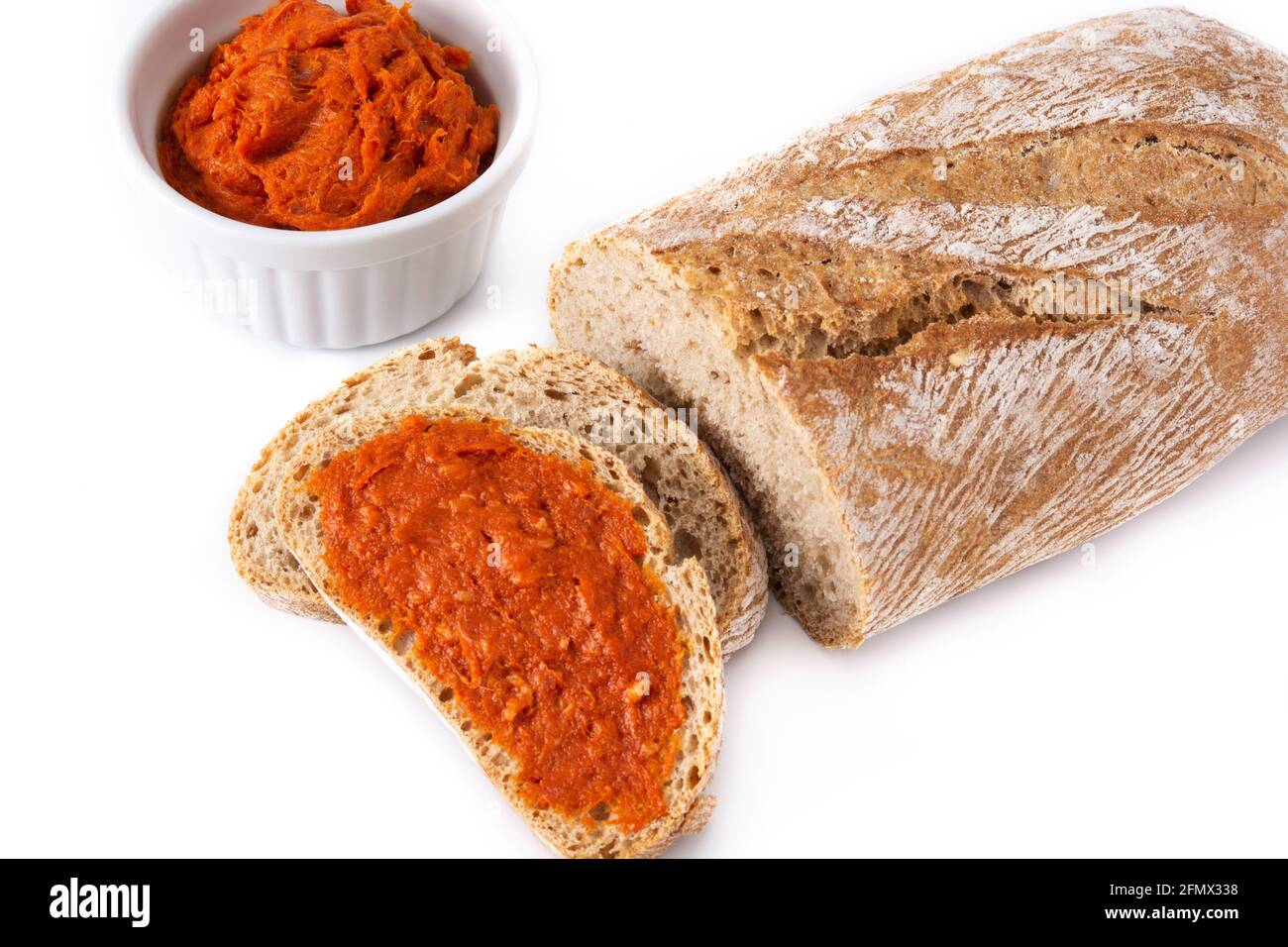 Sliced toast bread with sobrasada isolated on white background. Typical ...