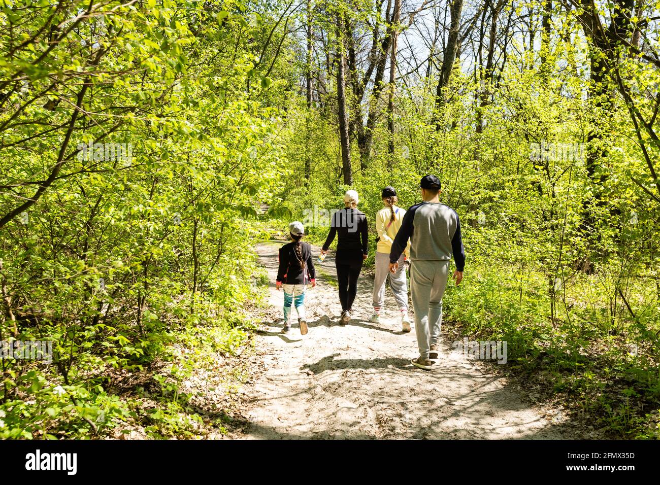 Group walking people holding signs hi-res stock photography and images ...