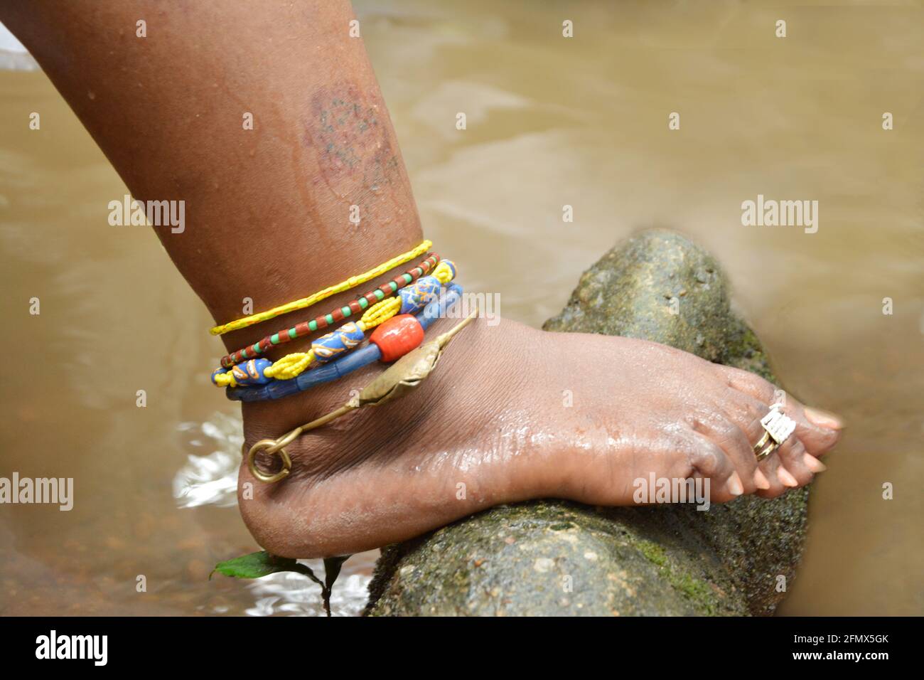 Osun Osogbo Ornamentation: Anklets of beads and gold, beringed toes ...