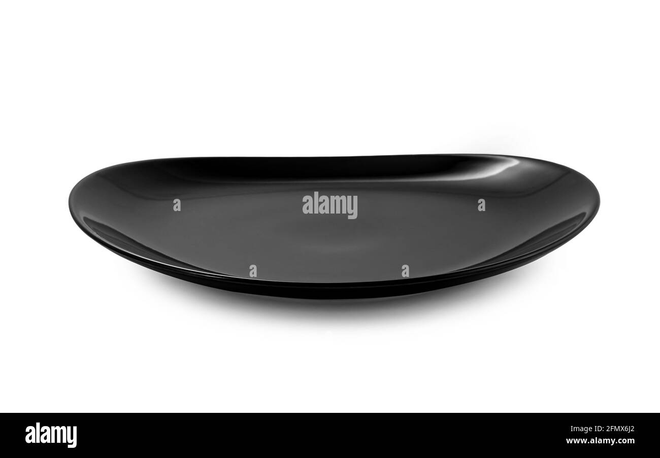 black plate isolated on white background Stock Photo - Alamy