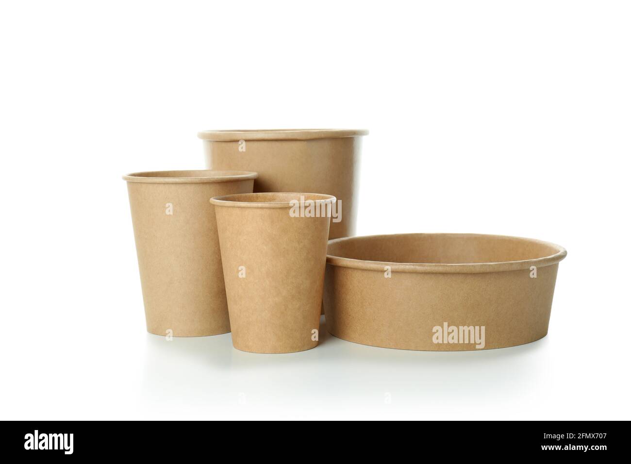 Paper disposable tableware isolated on white background Stock Photo - Alamy