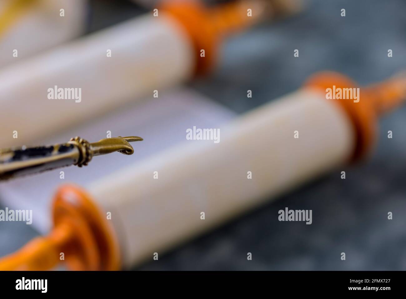 Judaic religion of Torah Scrolls with a pointer in a Jewish synagogue ...