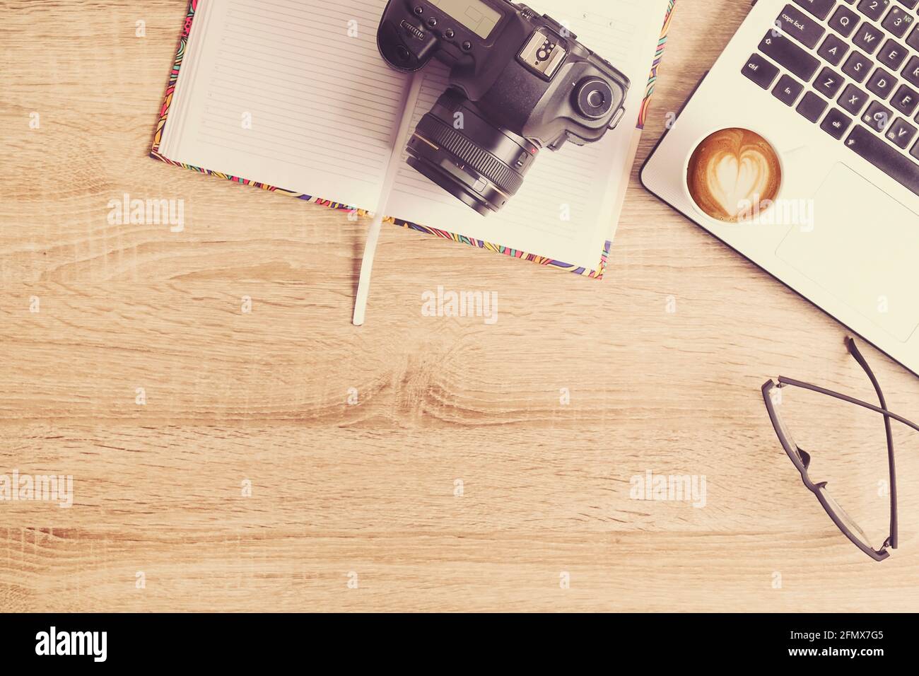 Photographer desk concept. Top view of designers table with pc laptop ...