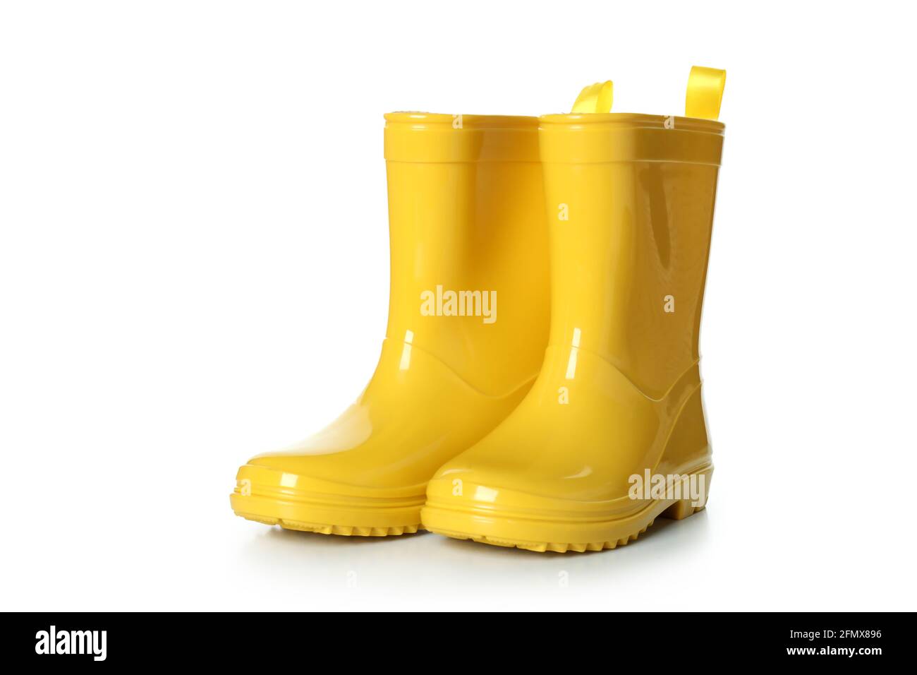 Yellow rubber boots isolated on white background Stock Photo - Alamy