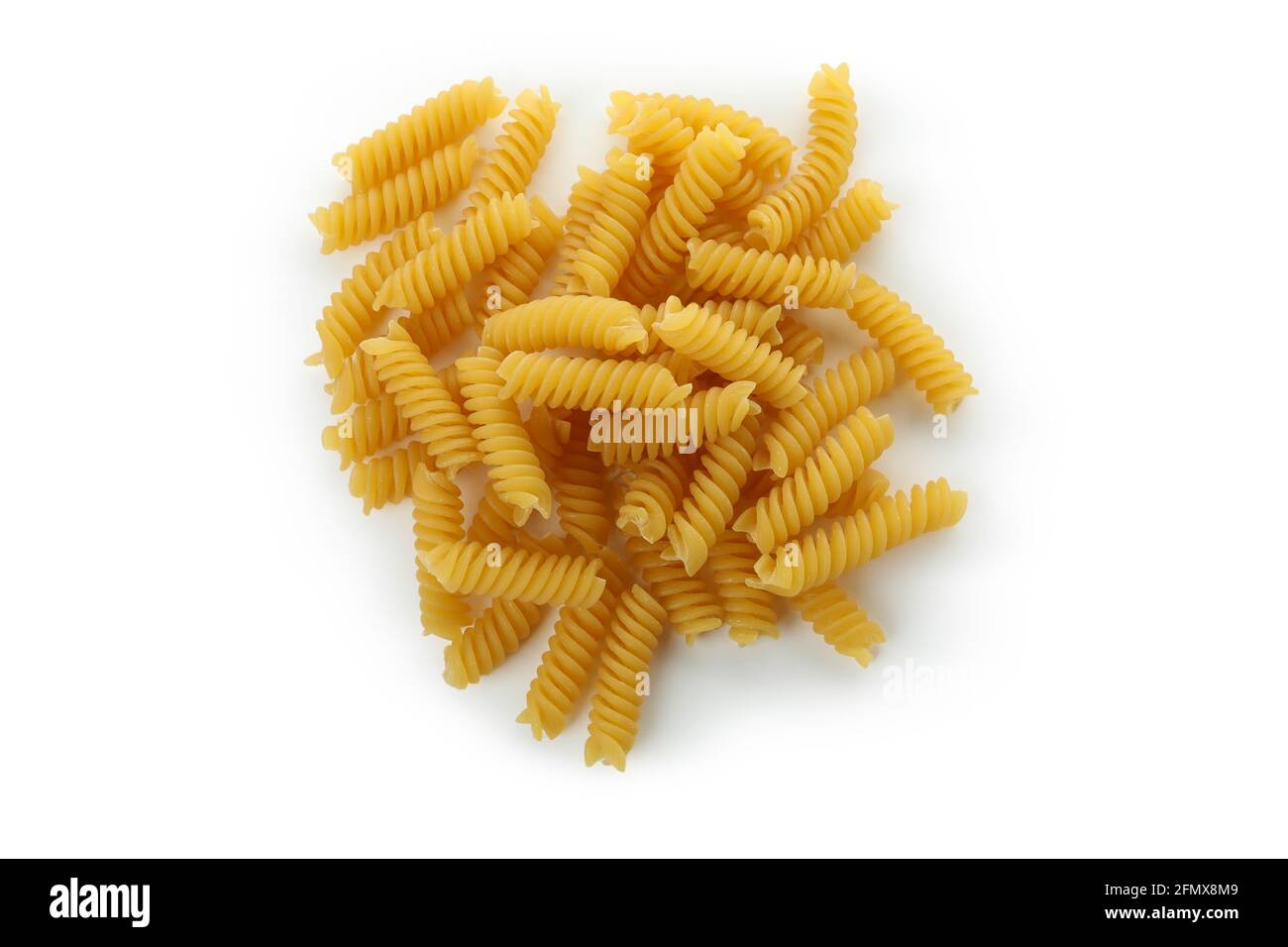 Uncooked raw pasta isolated on white background Stock Photo - Alamy
