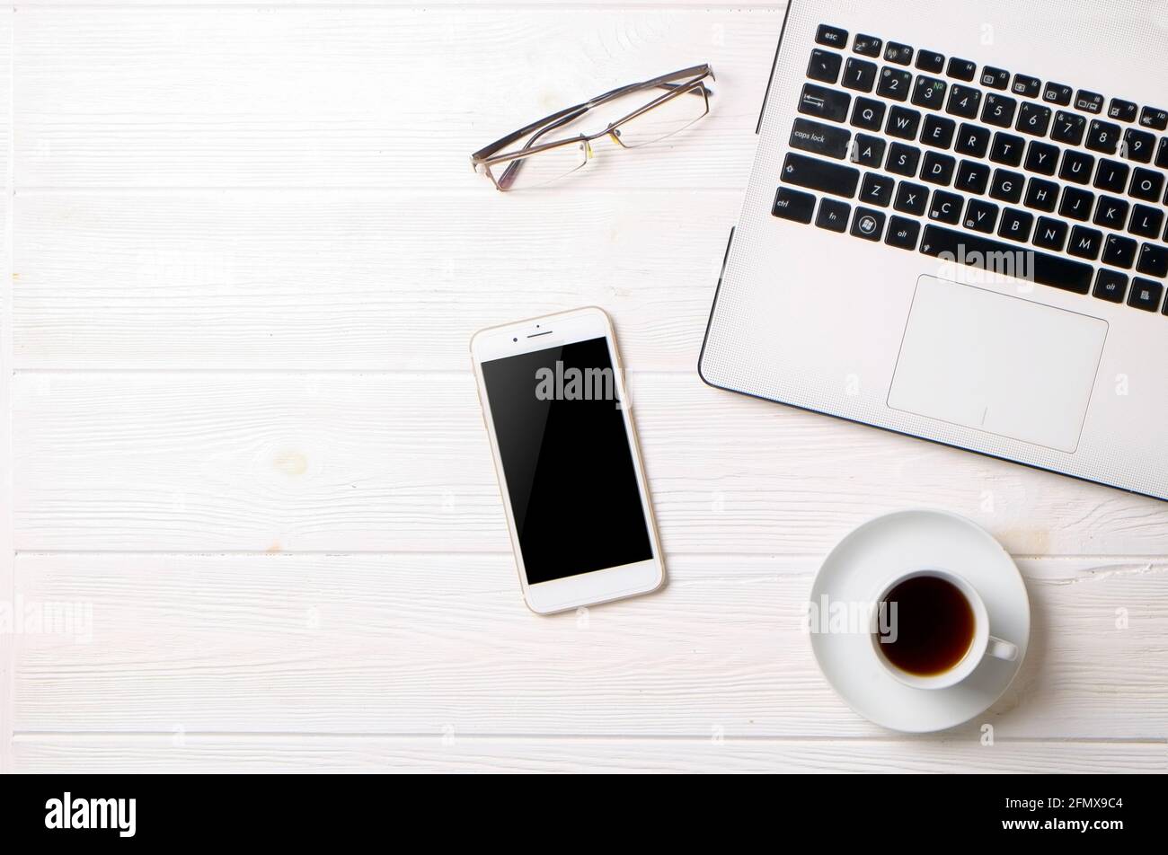 Minimalistic flat lay composition of black & white laptop computer ...