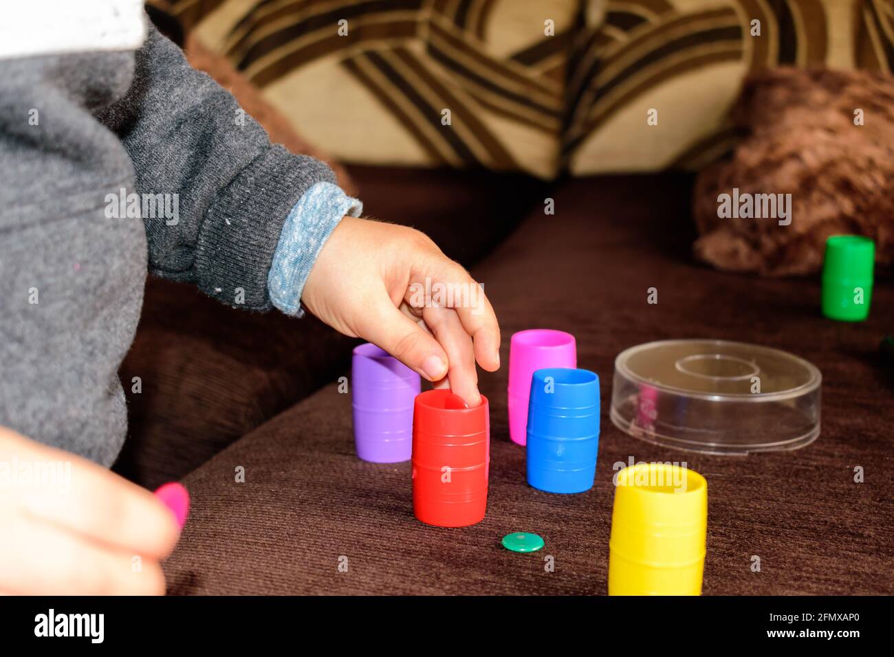 Boy playing board games Stock Photo - Alamy