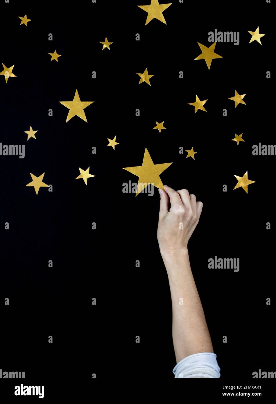 Hand reaching to sky hi-res stock photography and images - Alamy