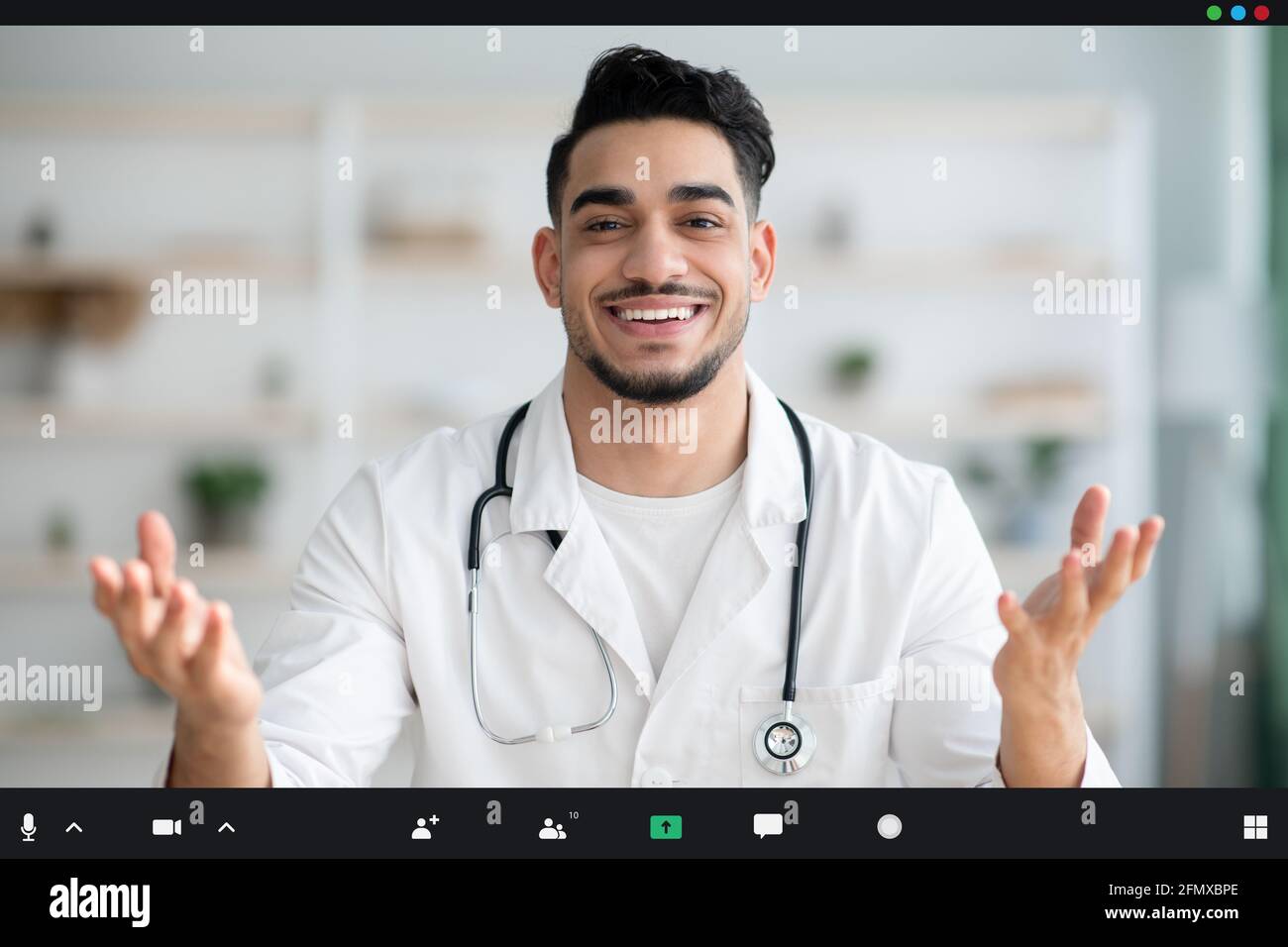 Cheerful young arab man doctor having video call with patient Stock ... Cheerful young arab man doctor having video call with patient Stock ...