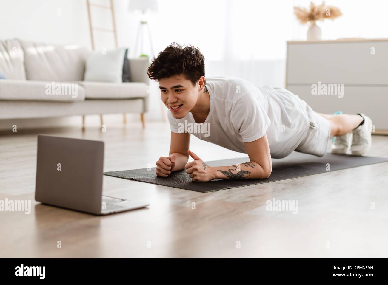 Young man asian doing hi-res stock photography and images - Alamy