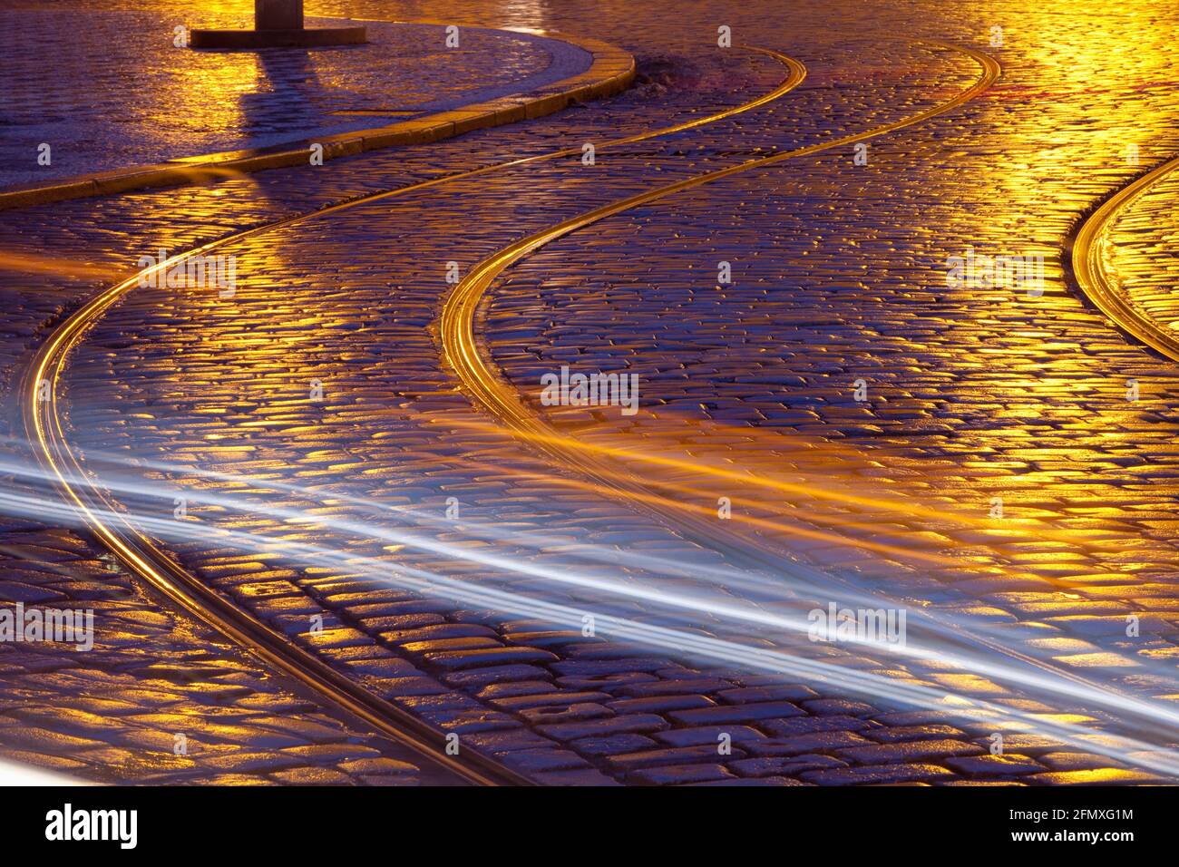 Prague streets with cobblestones and streetcar rails Stock Photo - Alamy