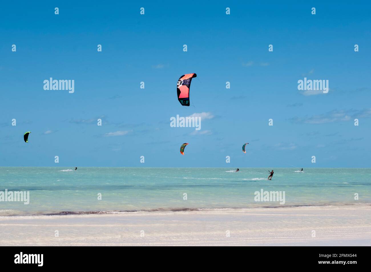 Kite surfing from the tropical beach of Holbox Island in Mexico, during ...