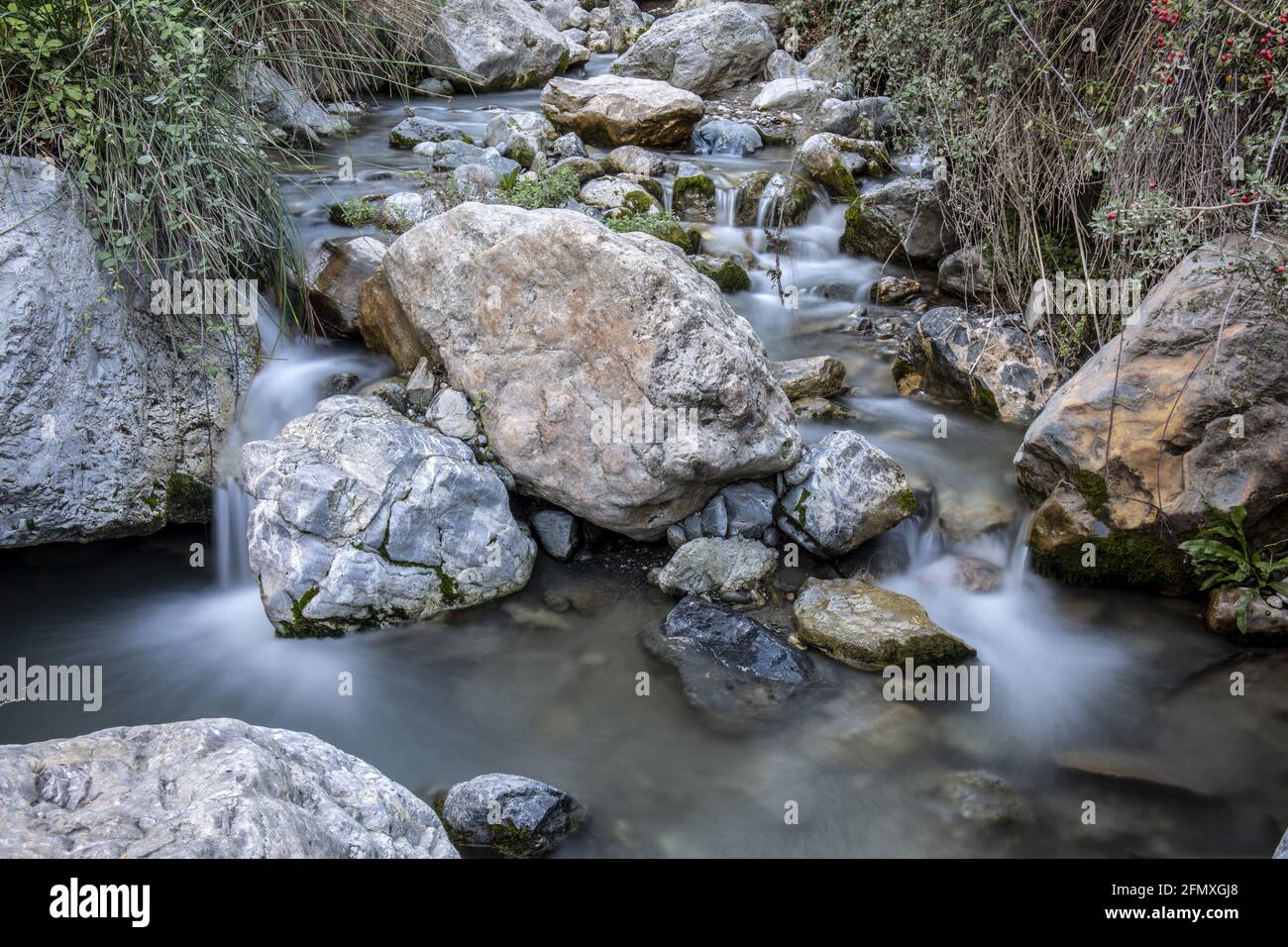 Beautiful scenery of water flowing over rocks with long exposure Stock ...