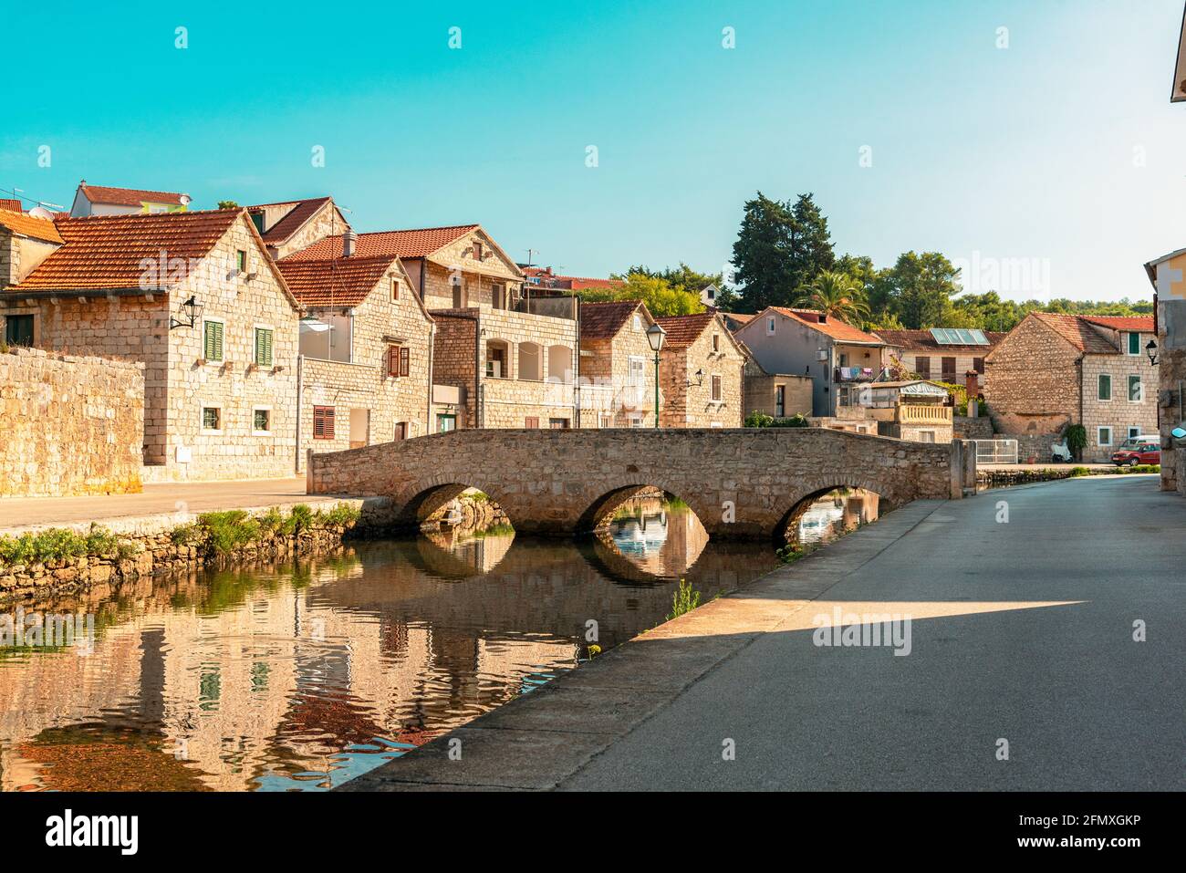Bridge over channel in Vrboska, north coast of the island of Hvar in ...