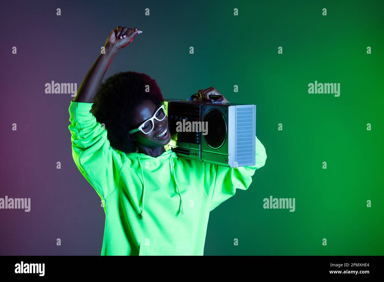 Photo of disco 90s lady hold vintage radio wear eyewear sweatshirt ...