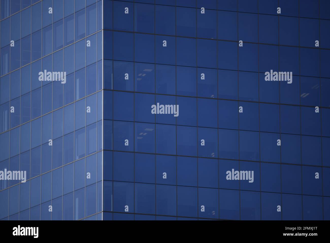 Corporate offices high-rise building blue glass facade in downtown San ...