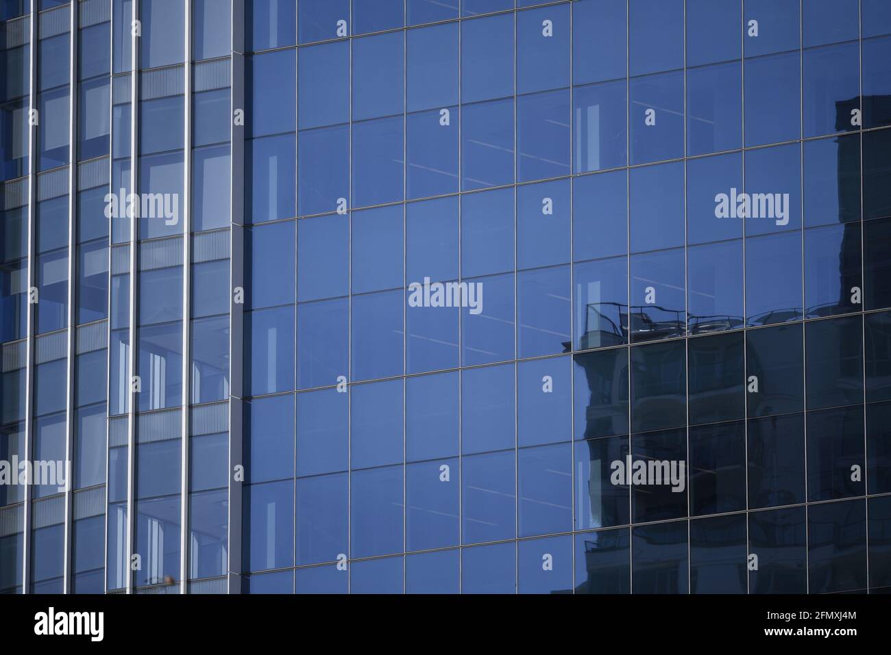 Corporate offices high-rise building blue glass facade in downtown San ...