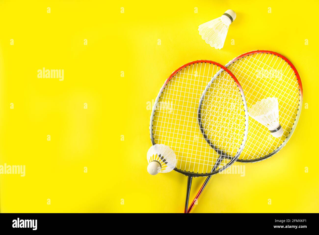 Summer sport activity concept. Two badminton paddle rackets with ...