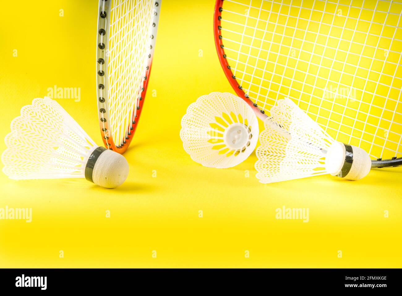 Summer sport activity concept. Two badminton paddle rackets with ...