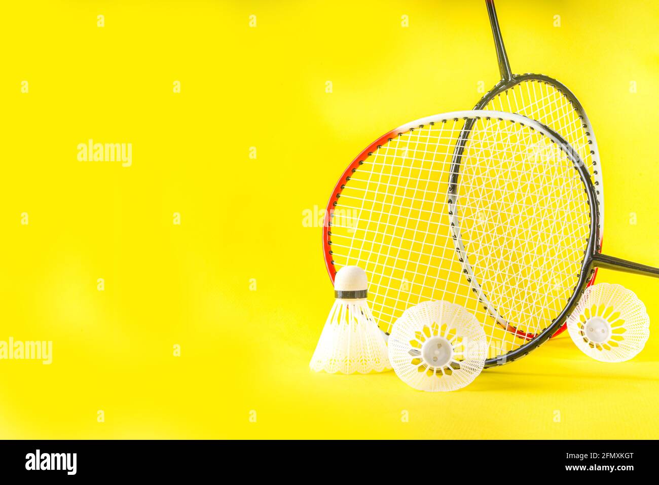 Summer sport activity concept. Two badminton paddle rackets with ...