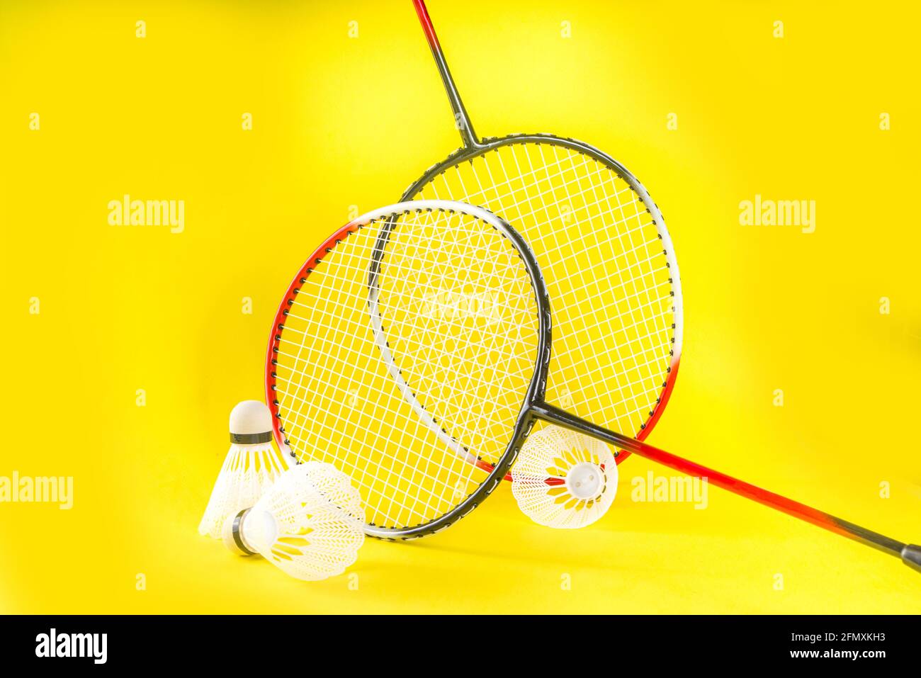 Summer sport activity concept. Two badminton paddle rackets with ...