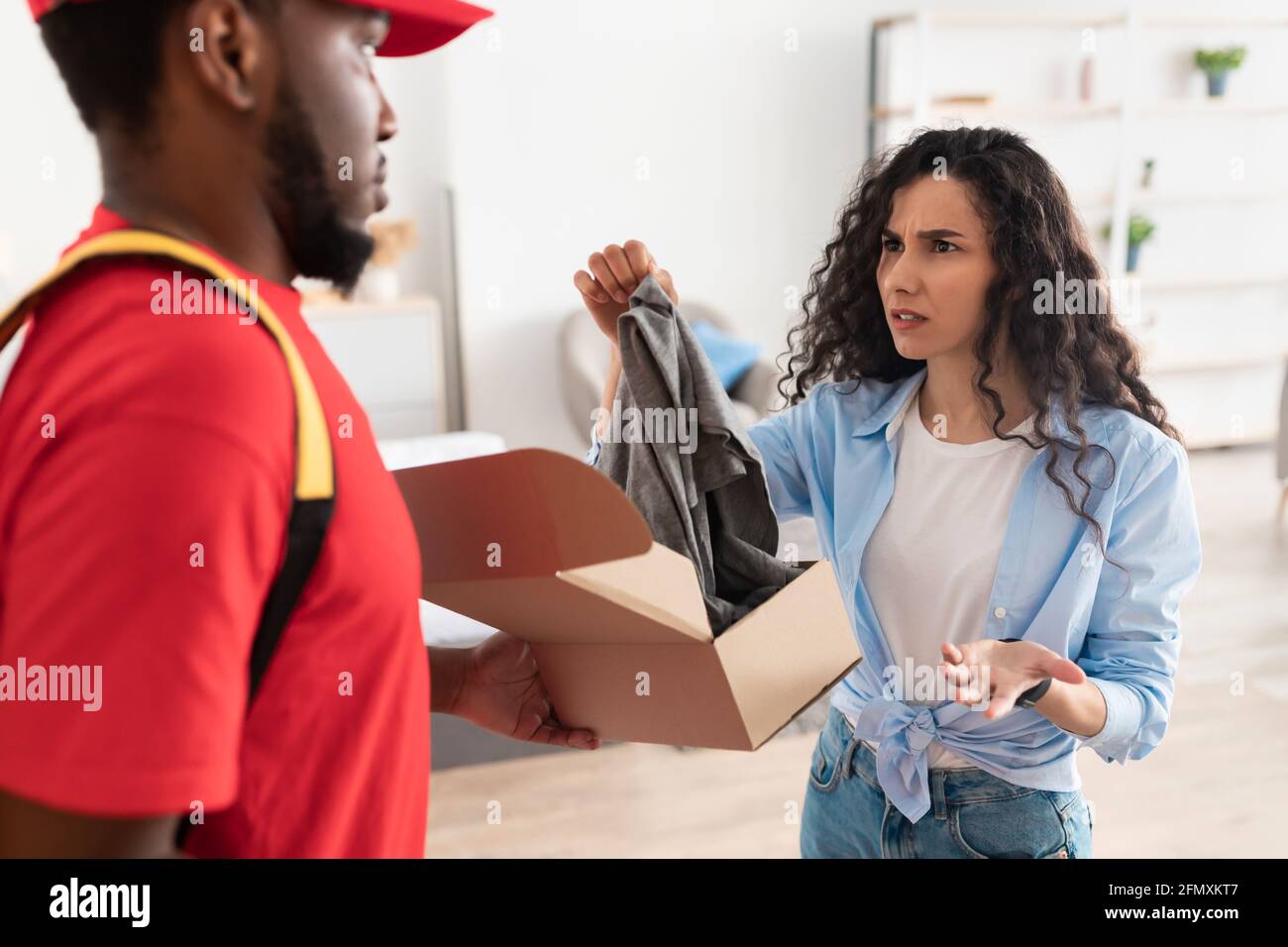 Angry Customer Clothes Shop High Resolution Stock Photography and ...